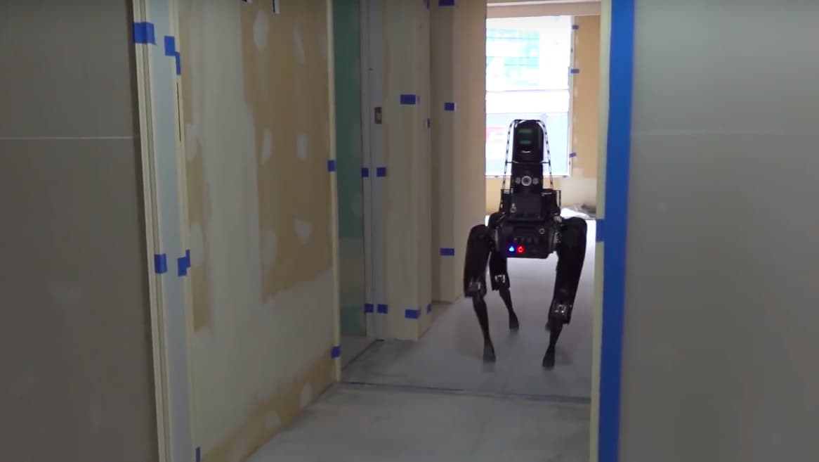 Four legged robot inspects building site