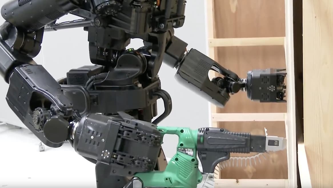 Robot builder installs drywall